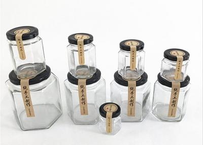China Food Grade Glass Honey Bottles With Metal Lid Eco - Friendly Feature for sale