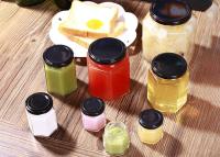 China Food Grade Glass Honey Bottles With Metal Lid Eco - Friendly Feature for sale