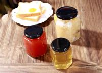 China Food Grade Glass Honey Bottles With Metal Lid Eco - Friendly Feature for sale