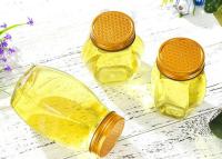 China Oval Hexagonal Glass Honey Jars Transparent Color Moistureproof Feature for sale