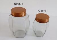 China Oval Hexagonal Glass Honey Jars Transparent Color Moistureproof Feature for sale