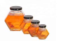 China 8 Oz Hexagon Honey Jars With Screw Tin Lid Customized Logo Printing for sale