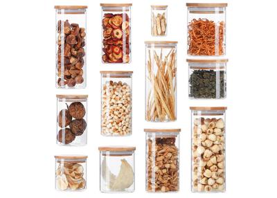China Cylinder Sealable Glass Bottles With Bamboo Lid High Borosilicate for sale
