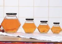 China 250ml-750ml Glass Honey Jars With Lids , Hexagon Glass Jars Clear Color for sale