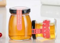 China Mini Glass Honey Jars , Empty Honey Bottles 25ml 35ml 75ml 100ml for sale