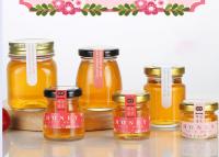 China Mini Glass Honey Jars , Empty Honey Bottles 25ml 35ml 75ml 100ml for sale