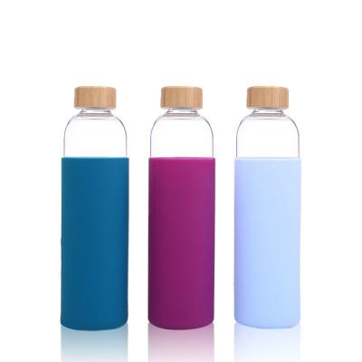 China 500ml Size Customized Logo Glass Sports Water Bottle BPA Free Bamboo Lid for sale