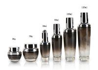 China Black Cosmetic Glass Bottles Lotion Bottle Set Cream Jar 50g Cartons Packing for sale