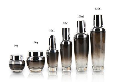 China Black Cosmetic Glass Bottles Lotion Bottle Set Cream Jar 50g Cartons Packing for sale