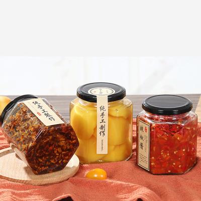 China Screw Cap Hexagonal Shaped Glass Storage Jars , Spice Jam Glass Honey Jars for sale