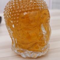 China Buddha Head Shape Empty Glass Wine Bottles Unique 750ml For Vodka / Whisky With Stopper for sale