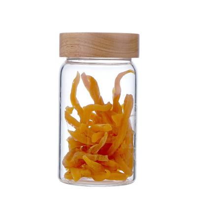 China High Borosilicate Empty Glass Jars Air Tight Storage Jars Containers With Wood Lid for sale
