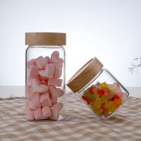 China High Borosilicate Empty Glass Jars Air Tight Storage Jars Containers With Wood Lid for sale