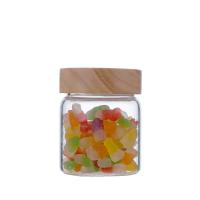 China High Borosilicate Empty Glass Jars Air Tight Storage Jars Containers With Wood Lid for sale