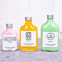 China Eco Friendly Glass Beverage Bottles 100ml Small Flat Coffee Cup With Aluminum Lid Milk Tea Bottle for sale