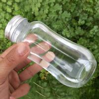 China Food Grade Empty Clear Glass Juice Bottles 200ml Capacity With Aluminum Cover for sale