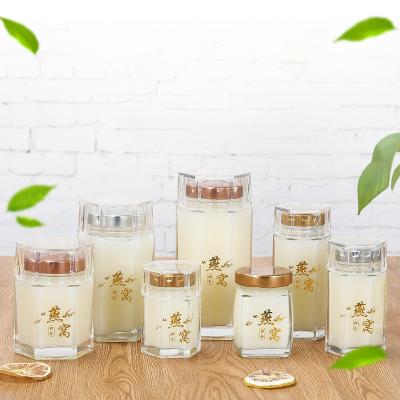 China High Grade Hexagonal Glass Honey Jars Clear Color With Eco Friendly for sale