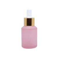 China Luxury Round Cosmetic Glass Bottles Frosted Pink Glass Bottle Eco - Friendly for sale