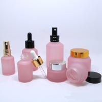 China Luxury Round Cosmetic Glass Bottles Frosted Pink Glass Bottle Eco - Friendly for sale