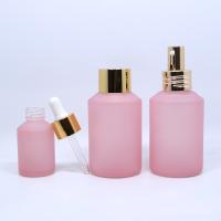 China Luxury Round Cosmetic Glass Bottles Frosted Pink Glass Bottle Eco - Friendly for sale