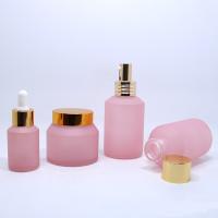 China Luxury Round Cosmetic Glass Bottles Frosted Pink Glass Bottle Eco - Friendly for sale