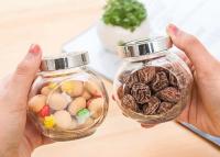 China Clear Flat Drum Shape Empty Glass Jars Food Storage For Candy / Spices for sale
