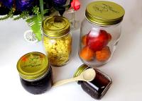 China Clear Carved Glass Storage Jars With Gold Color Screw Lid Round Shape for sale