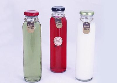 China Clear 350ml Round Glass Bottle For Milk Packaging With Colored Screw Metal Lid for sale