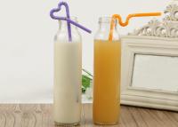 China Clear 350ml Round Glass Bottle For Milk Packaging With Colored Screw Metal Lid for sale