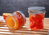 China 100ml 200ml 300ml clear glass jam jars glass mason jar with screw metal lids for sale
