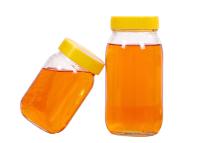 China Round Clear Honey Jars Hexagon Glass Jar With Black Lids 500ml 1000ml for sale