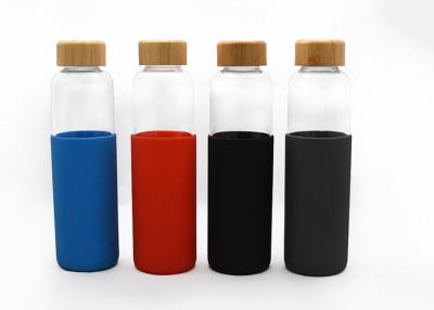 China Custom Unbreakable Glass Water Bottle Bamboo Glass Water Bottle With Silicone Sleeve for sale