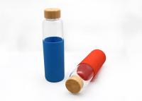 China Custom Unbreakable Glass Water Bottle Bamboo Glass Water Bottle With Silicone Sleeve for sale