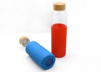 China Custom Unbreakable Glass Water Bottle Bamboo Glass Water Bottle With Silicone Sleeve for sale