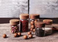 China Clear Small Coffee Canister Glass Kitchen Storage Jars With Wood Lid Round Shape for sale
