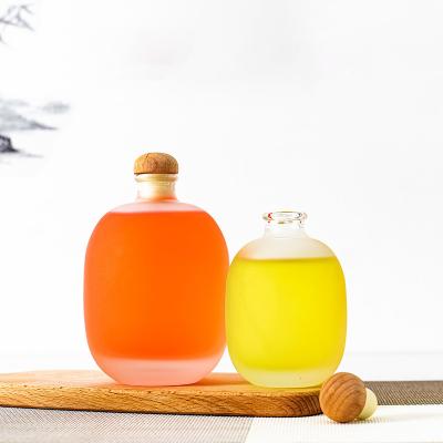 China Beverage Flat 250ml 500ml Capacity Glass Juice Bottles for sale