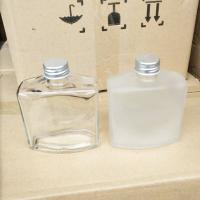 China 250ML Glass Juice Bottles With Lids for sale