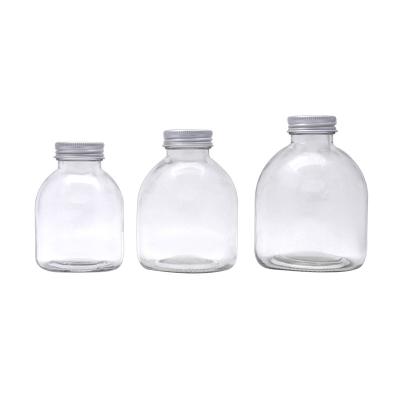 China 300ml 500ml Capacity Glass Beverage Bottles for sale