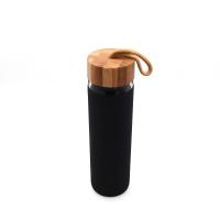 China Silicone Sleeve Bamboo Lid 600ml BPA Free Glass Water Bottle for sale