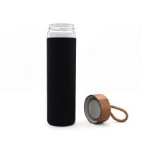 China Silicone Sleeve Bamboo Lid 600ml BPA Free Glass Water Bottle for sale