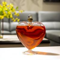 China Lead Free Screw Cap Heart Shaped Glass Wine Bottles for sale