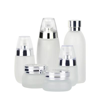 China Customized Logo Cosmetic Packaging Empty Glass Jars for sale