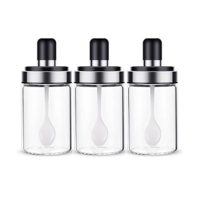 China FDA LFGB Seasoning Empty Glass Jars With Wooden Lid for sale