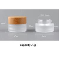 China Lotion Bamboo Cover 15g 20g Frosted Glass Cream Bottle for sale
