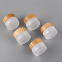 China Lotion Bamboo Cover 15g 20g Frosted Glass Cream Bottle for sale