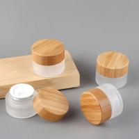 China Lotion Bamboo Cover 15g 20g Frosted Glass Cream Bottle for sale