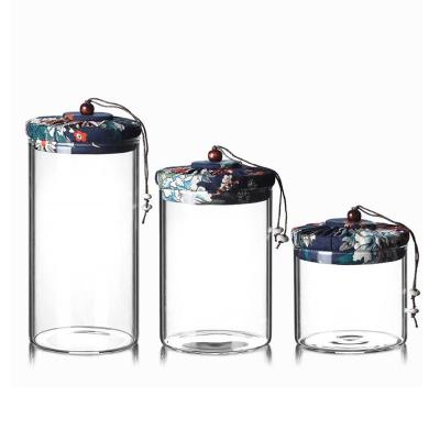 China Cloth Cover Sealed Borosilicate Glass Storage Jars for sale