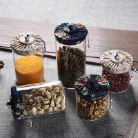 China Cloth Cover Sealed Borosilicate Glass Storage Jars for sale