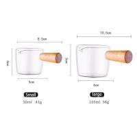 China Home Cooking Delicate Wooden Handle Glass Measuring Spoon for sale