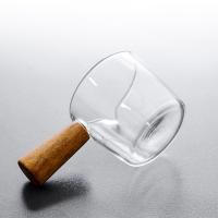 China Home Cooking Delicate Wooden Handle Glass Measuring Spoon for sale